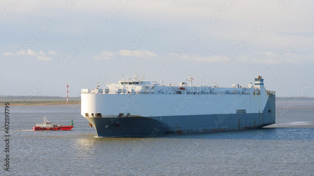 Port of Antwerp, Belgium - 11 24 2021: Pure car carrier leaving the ...
