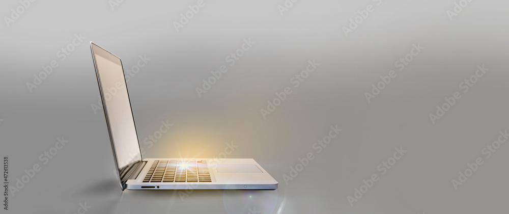 Laptop open and placed on a modern looking luxury background. and there ...