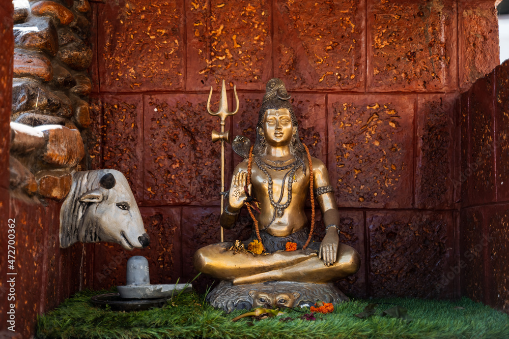 The statue of the bronze Shiva sits in the lotus position. A symbol of ...