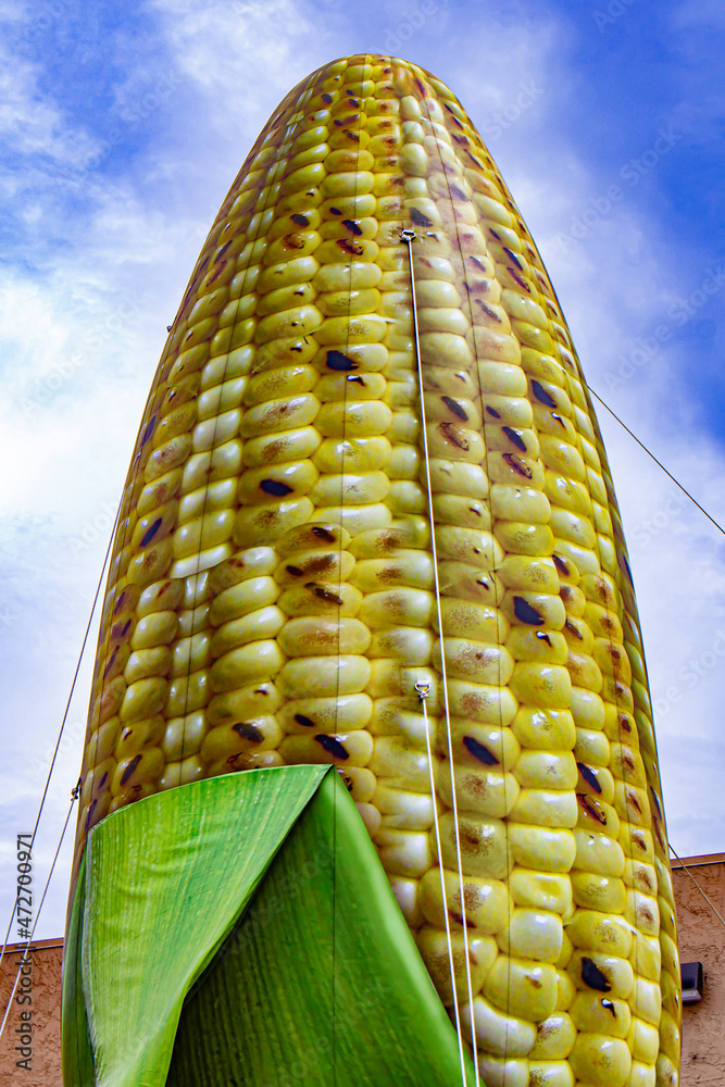 Giant Inflatable Ear of Corn Marks a Grilled Corn Food Stall at the ...
