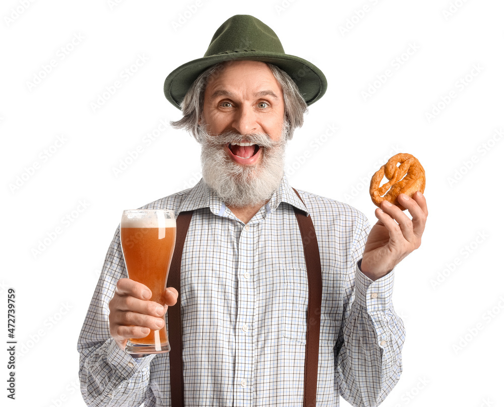 Handsome senior man in traditional German clothes, with beer and ...