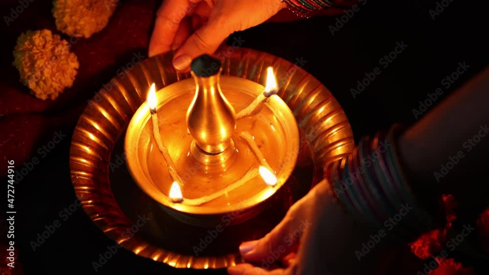 Indian woman holding lighting oil lamp Pongal Onam Diwali vishu ...