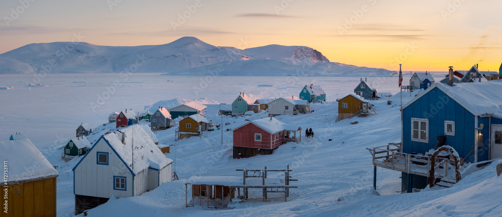 The traditional and remote Greenlandic Inuit village Kullorsuaq located ...