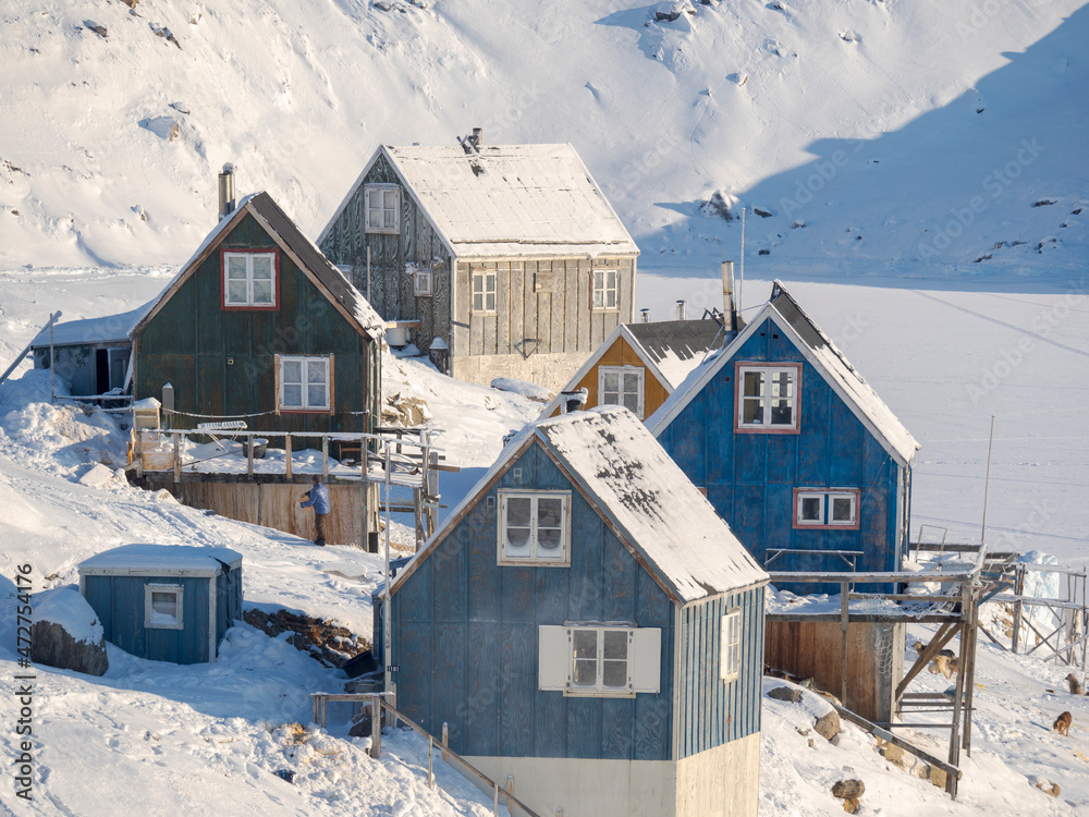 The traditional and remote Greenlandic Inuit village Kullorsuaq located ...