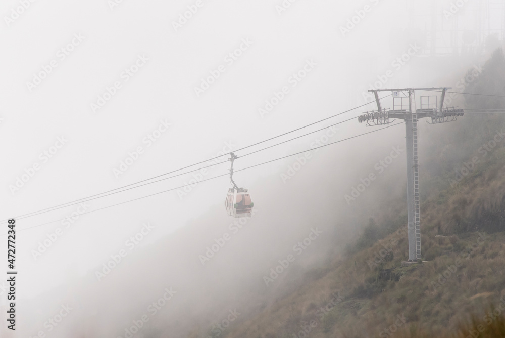 Ecuador, Quito. TeleferiQo cable car on Pichincha Volcano rises to ...