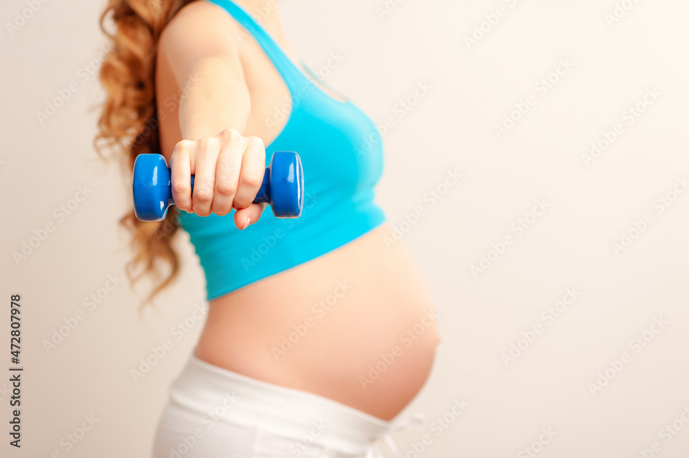Pregnant Female Do Exercise Against White Background Side View Body