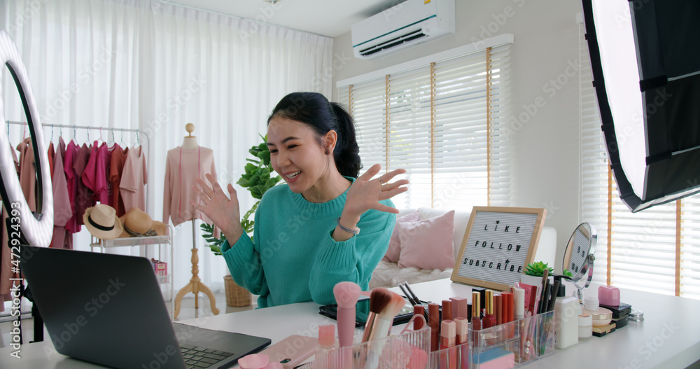 Asia woman micro influencer record live viral video camera at home ...