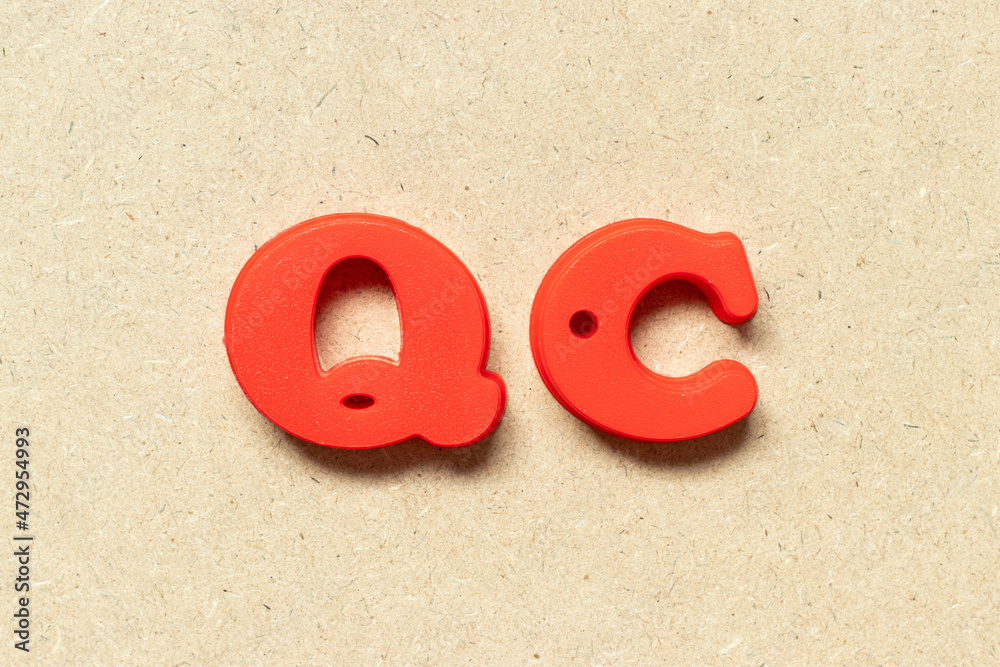 Plastic alphabet letter in word QC (Abbreviation of Quality Control) on ...