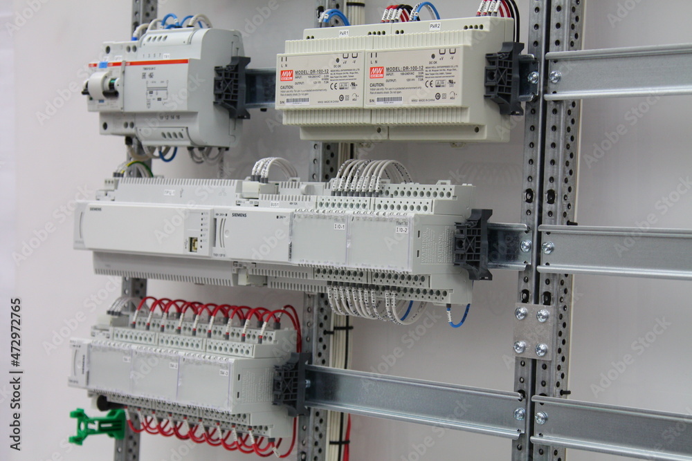 The microcontroller and the Siemens relay blocks are connected by a ...