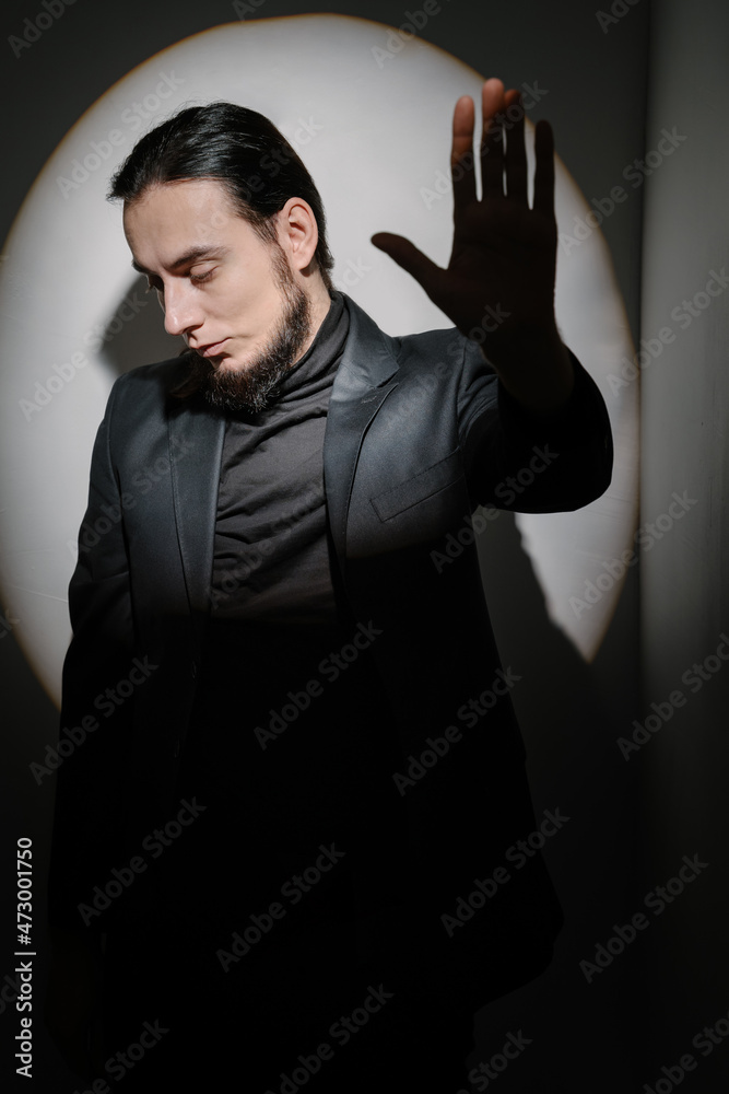 posture of denial and rejection with outstretched arm forward. Portrait ...