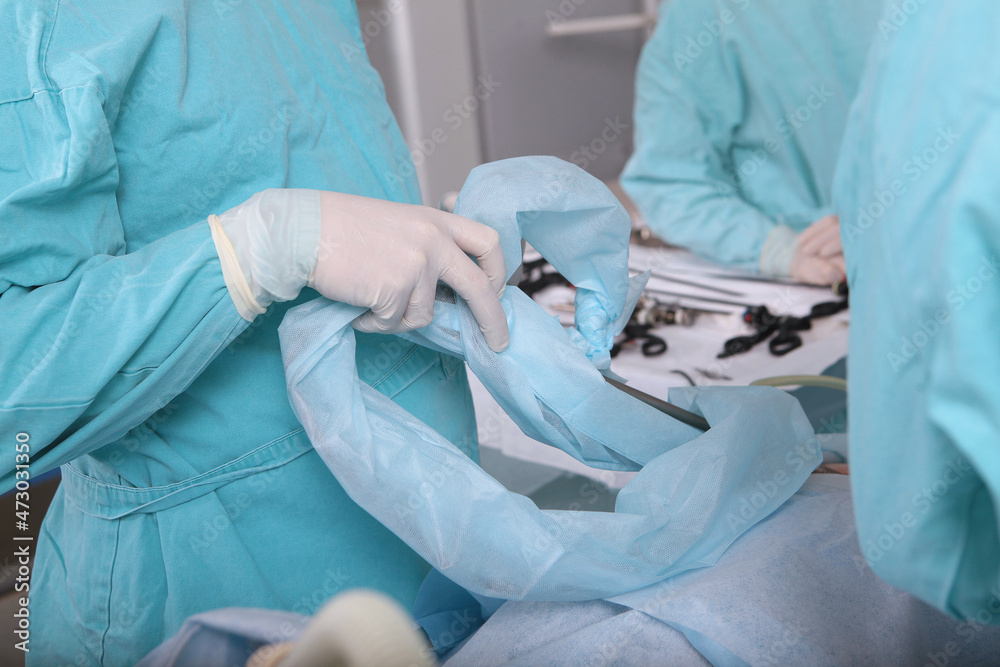 Surgeons perform laparoscopic surgery. Laparoscopic surgery. A real ...