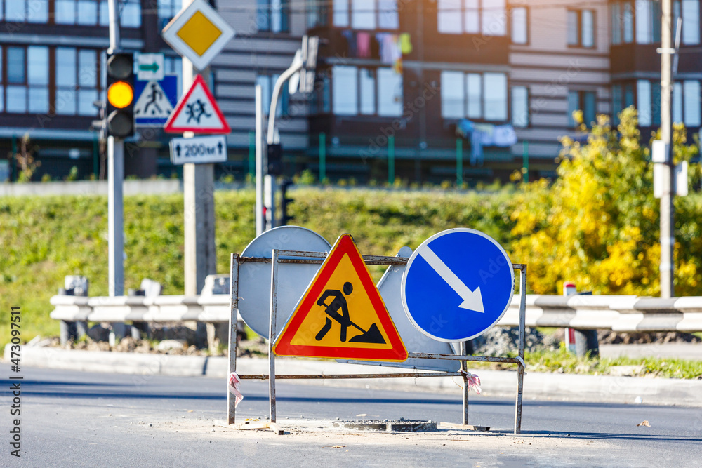 Road signs!Road works with trucks and traffic signs.road works road ...