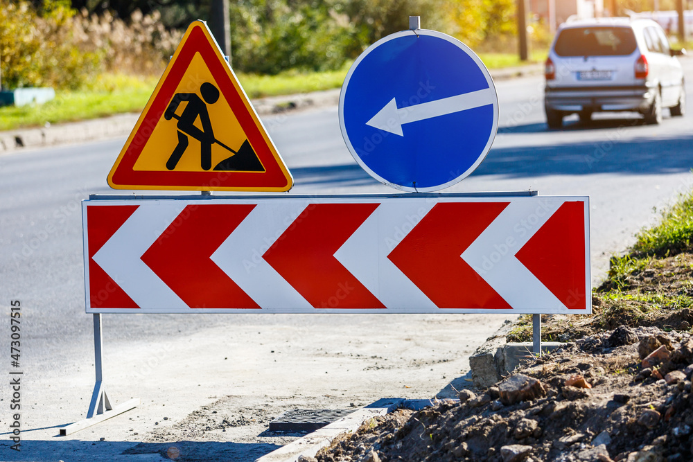 Road signs!Road works with trucks and traffic signs.road works road ...