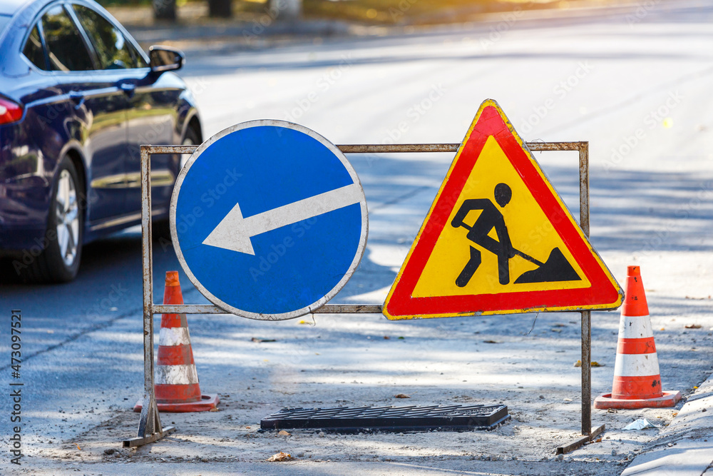 Road signs!Road works with trucks and traffic signs.road works road ...