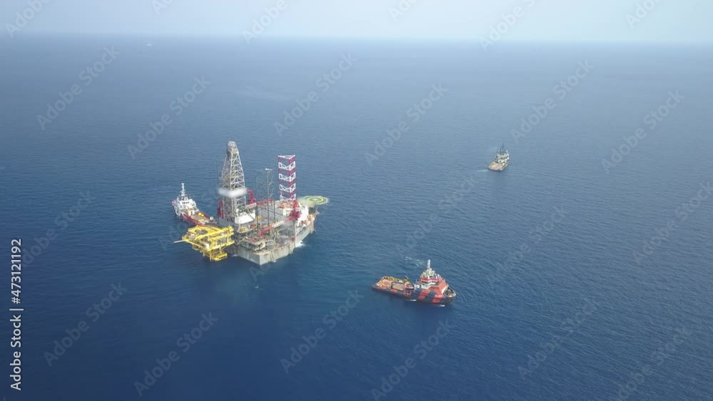 Aerial view from a drone of an offshore jack up rig, oil platform and ...