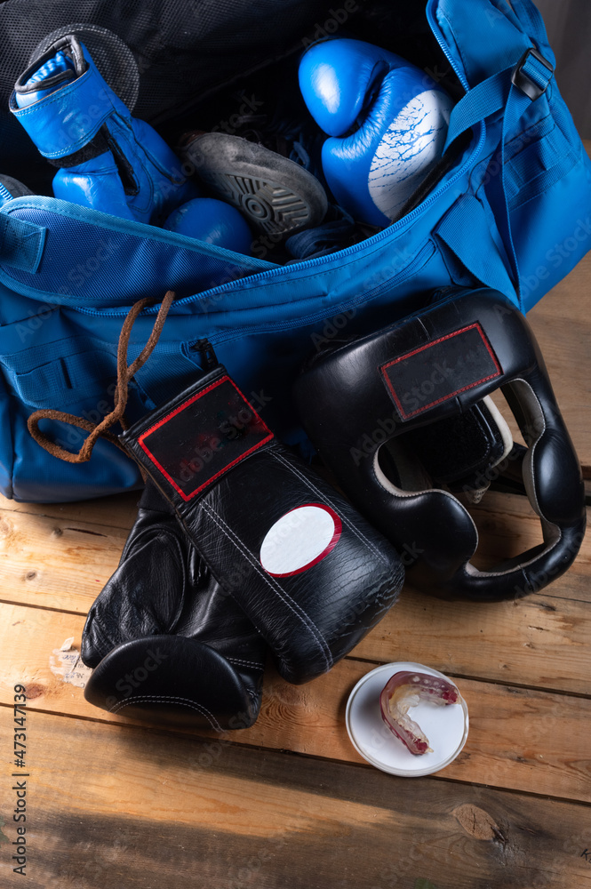 Boxing equipment and duffel bag. Boxing gloves and safety helmet. Stock ...
