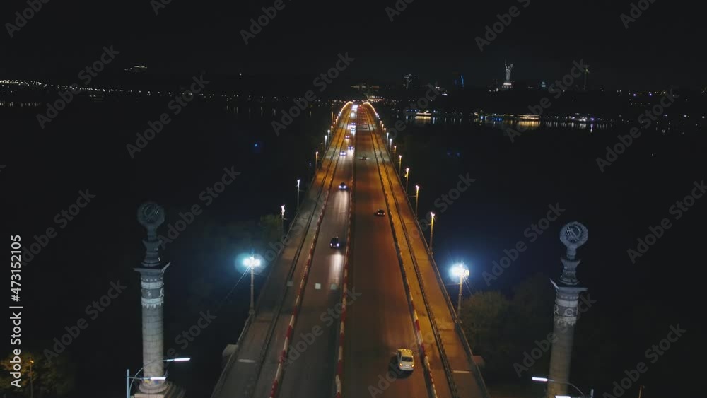 Night city Kiev. Ukraine. Modern architecture. transport moves along ...