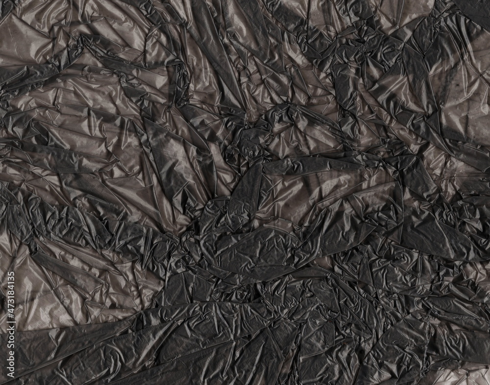 Plastic texture. Black plastic. The Plastic is polyethylene Crumpled ...
