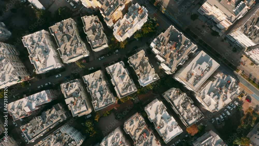 Top view of high-rise buildings and streets. Roofs of houses and roads ...