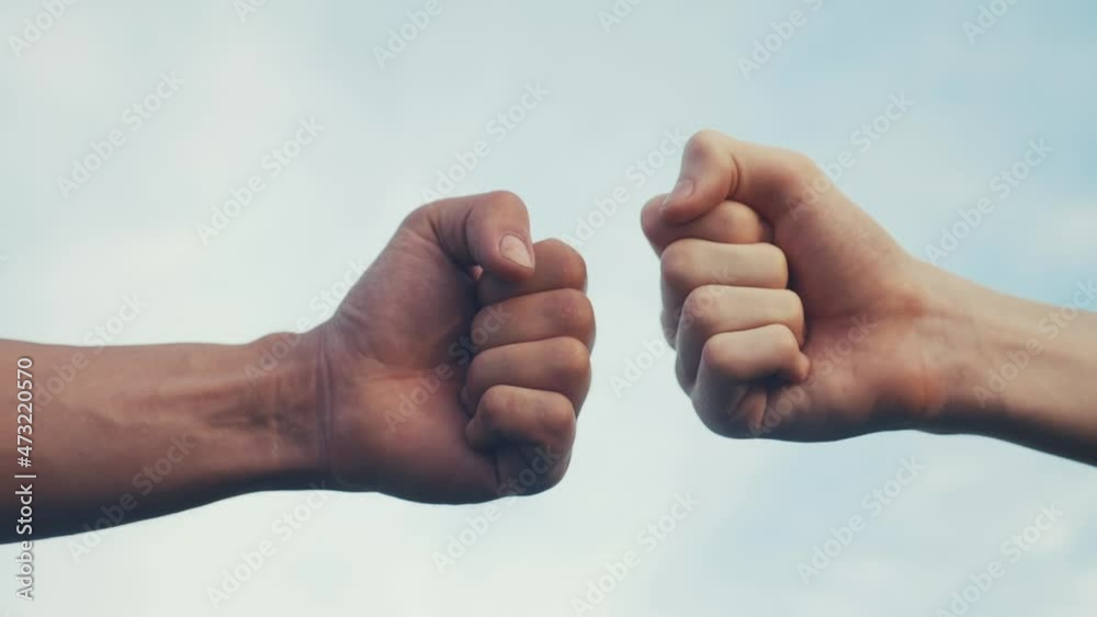 teamwork concept. fist to fist commit solidarity a respect and ...