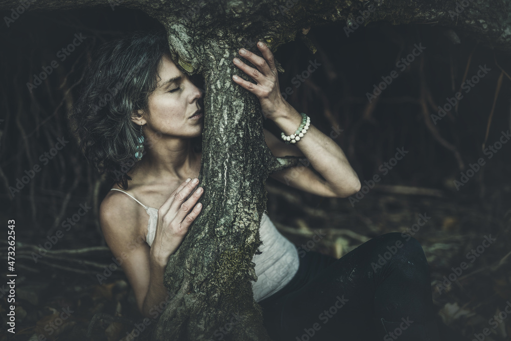 Sexy woman as a part of tree. Stock Photo | Adobe Stock