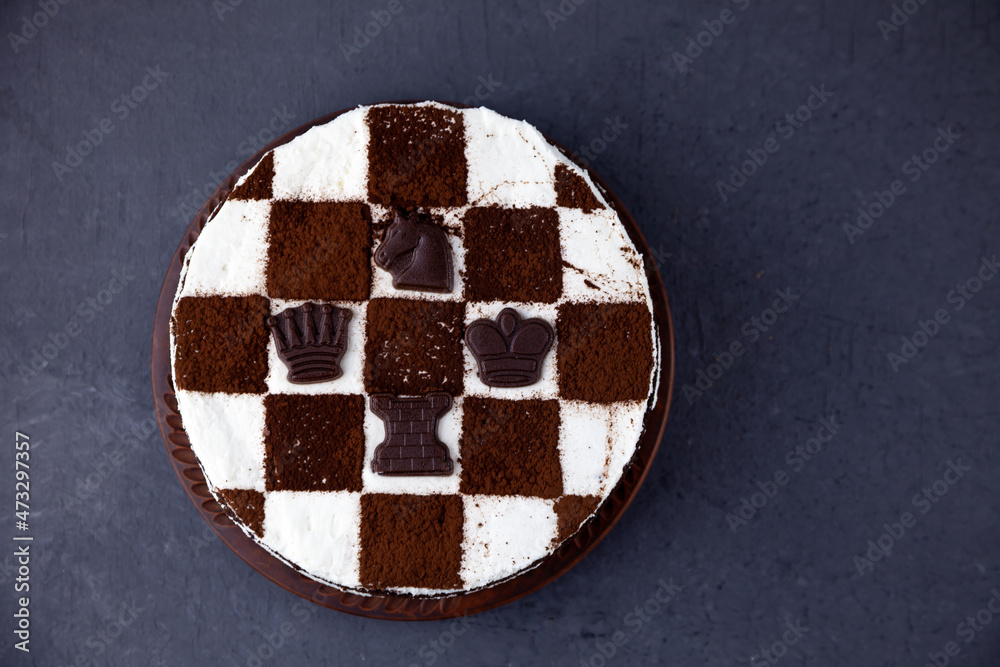 Sponge cake with butter cream. Cake in the form of a chessboard. A gift ...