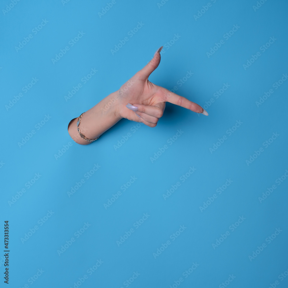 Point to the right, poke your finger in the direction. beautiful woman ...