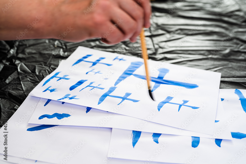 Japanese calligraphy. Hand drawing this East-Asia country's letters ...