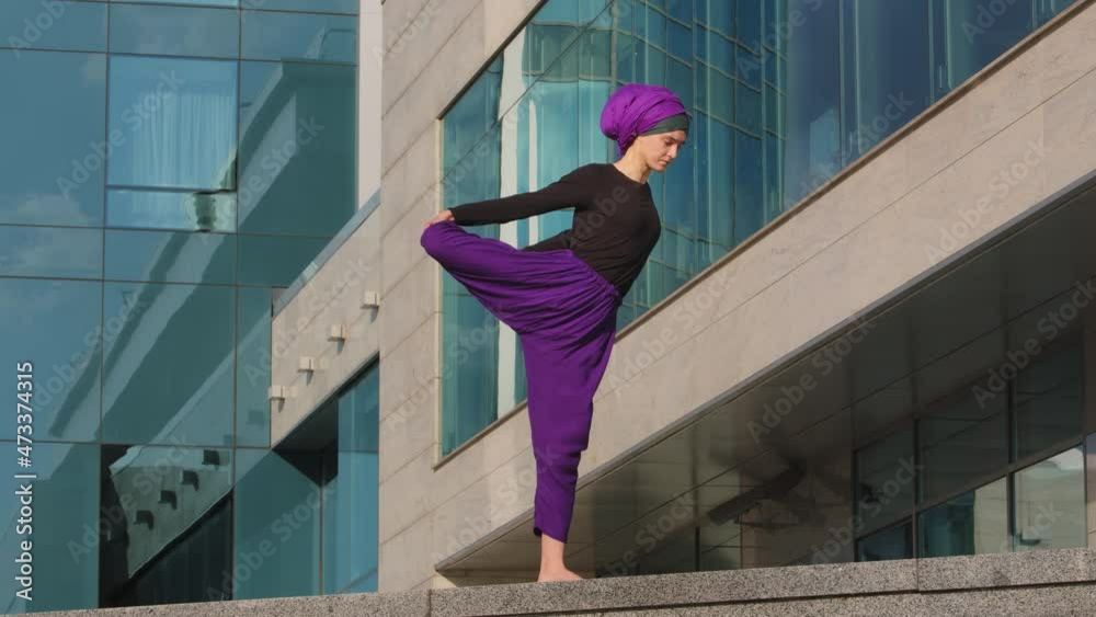 Strong calm woman muslim islamic girl in hijab barefoot lady in purple ...