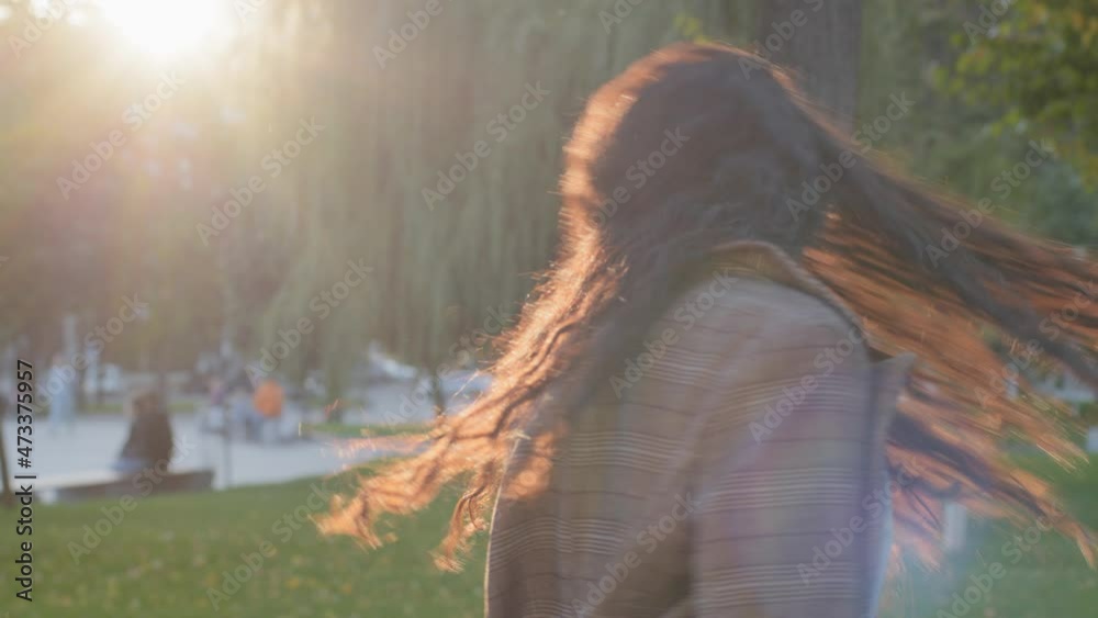 Vidéo Stock Back view happy excited laughing smiling long-haired curly ...