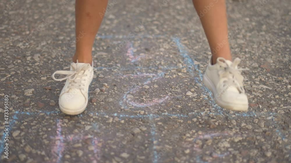 Child on playground play classics. School playground on asphalt ...