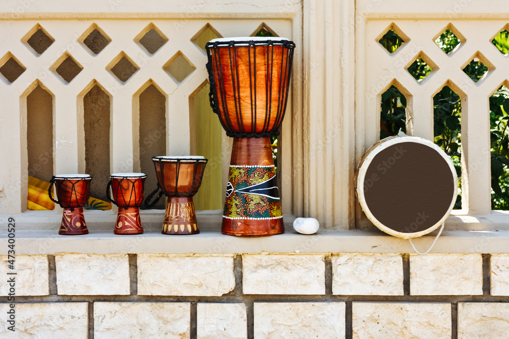 Turkish drums of different size and tambourine are on street for sale ...