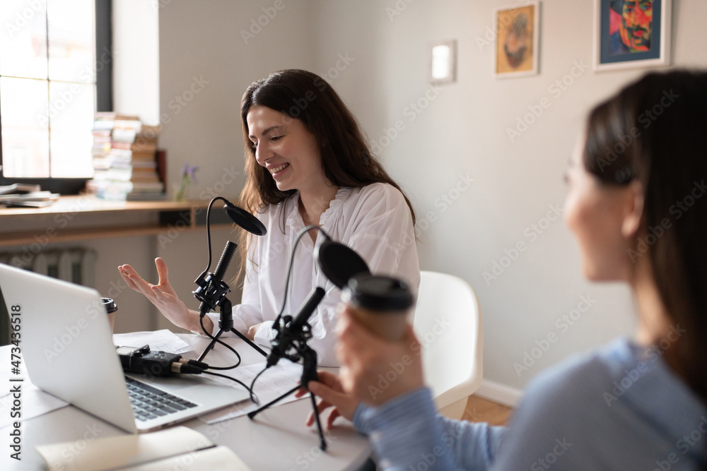 Optimistic influencer talking during broadcast Stock Photo | Adobe Stock
