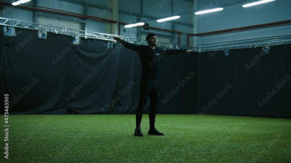 BTS of filmmaking. Actor is standing in T-pose for calibrating motion ...
