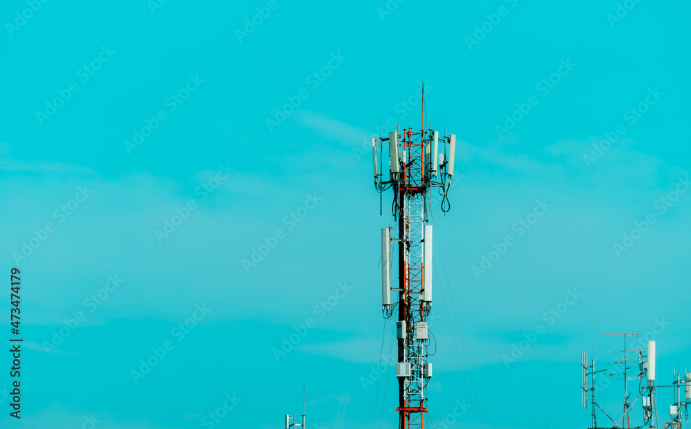 Telecommunication tower with blue sky background. Radio and satellite ...