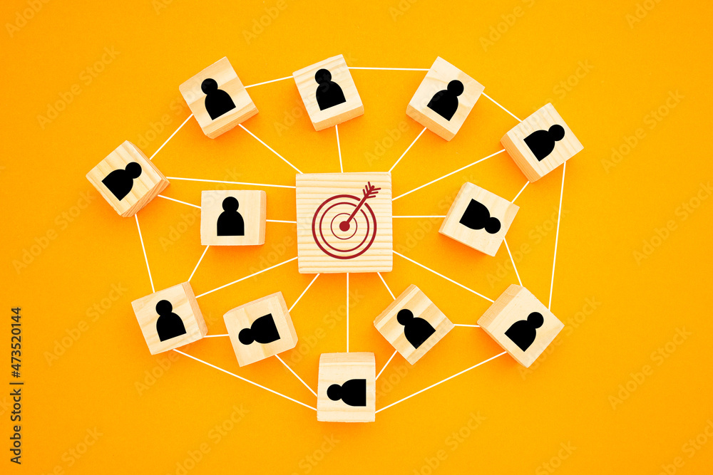 Teamwork and unity concept. Top view of wooden cubes with people icons ...