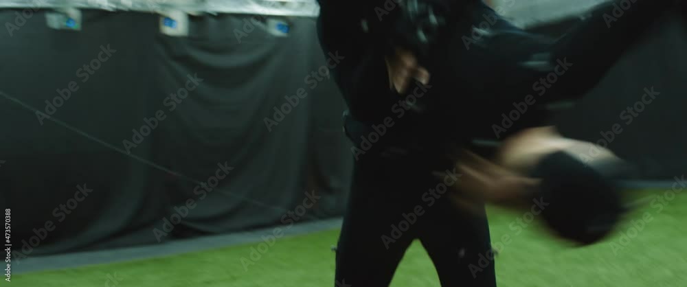 Actors wearing motion capture suits performing some fight moves as game ...