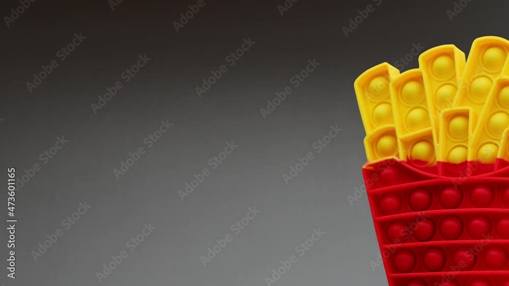 Slide shot of video 4k and full HD close up of anti stress pop it toy ...
