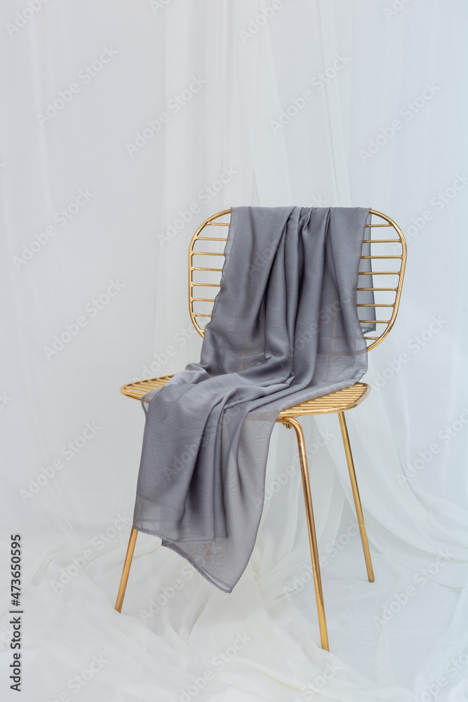 Scarf on chair Stock Photo | Adobe Stock