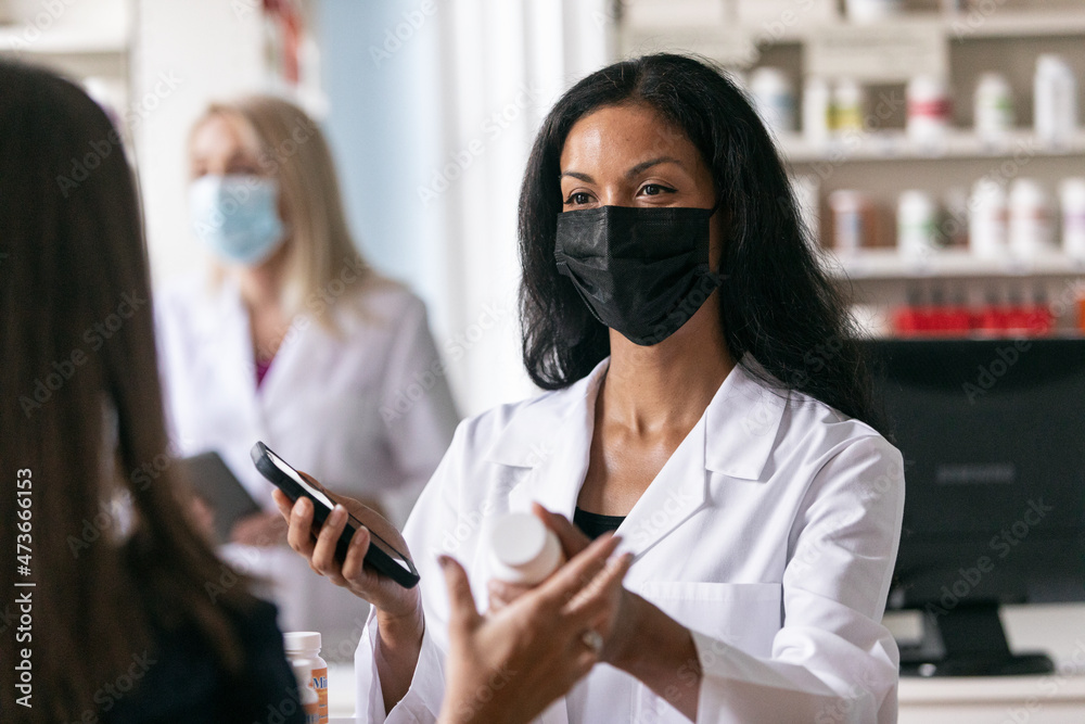 RX: Pharmacist Uses Smart Phone Stock Photo | Adobe Stock