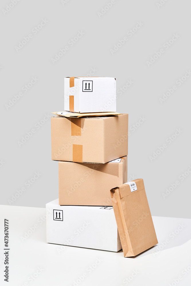 Carton boxes on white background Stock Photo | Adobe Stock