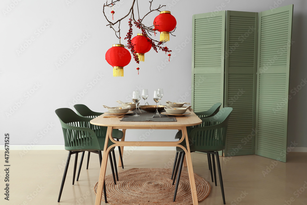 Beautiful table setting for Chinese New Year celebration in room Stock ...