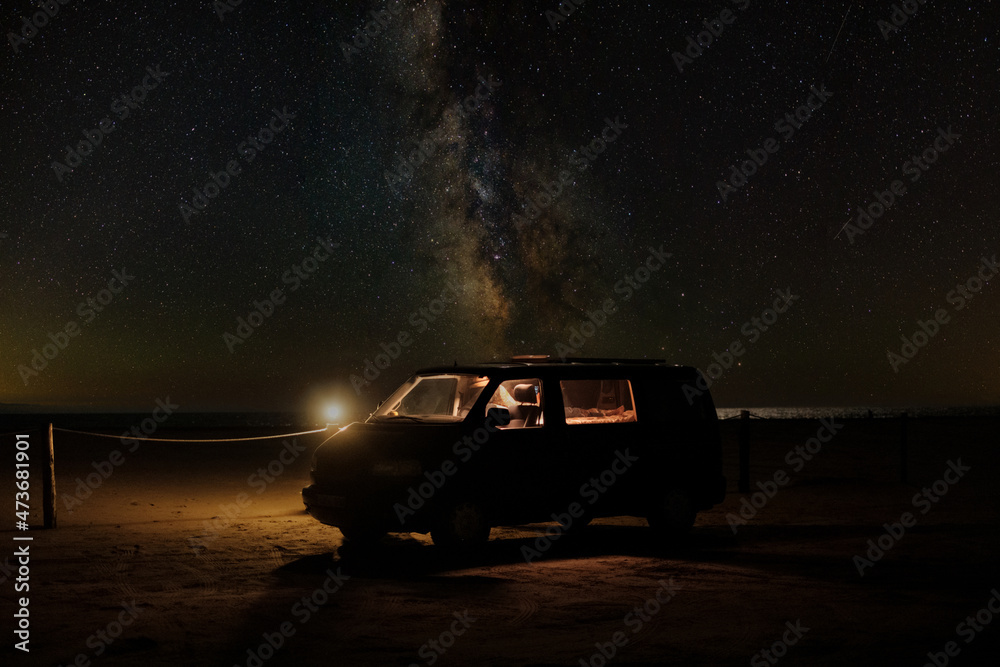 camper van illuminated at night Stock Photo | Adobe Stock