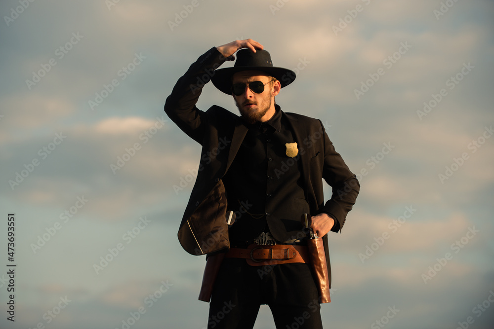 Cowboy shooter in cowboy hat. Serious man with wild west guns, retro ...