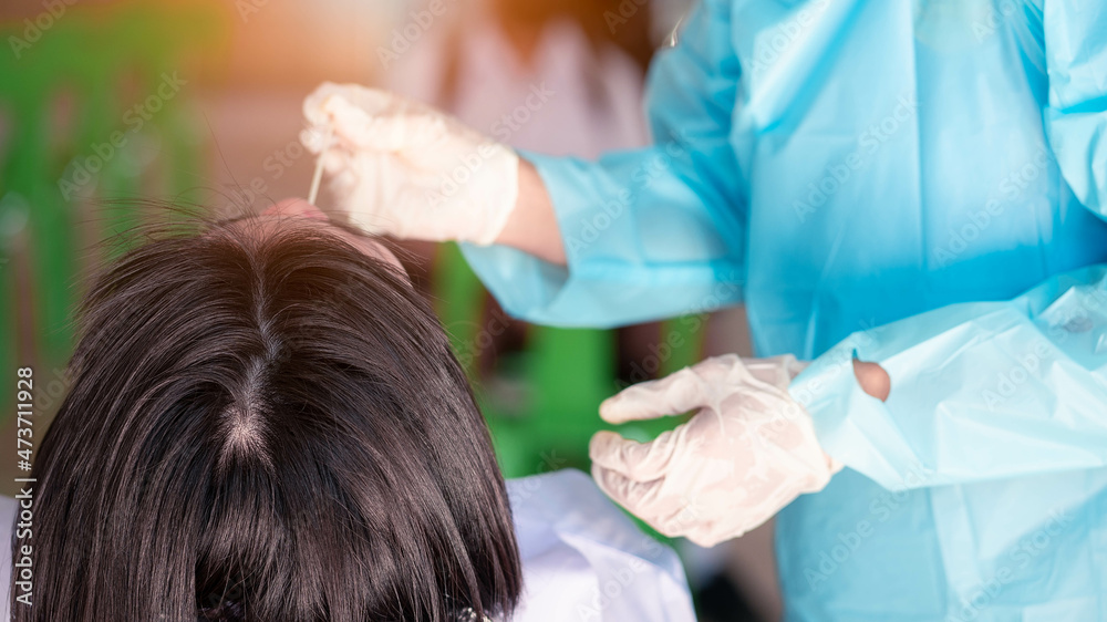 The Student swab COVID-19 testing by ATK or Rapid Antigen Test kit with ...