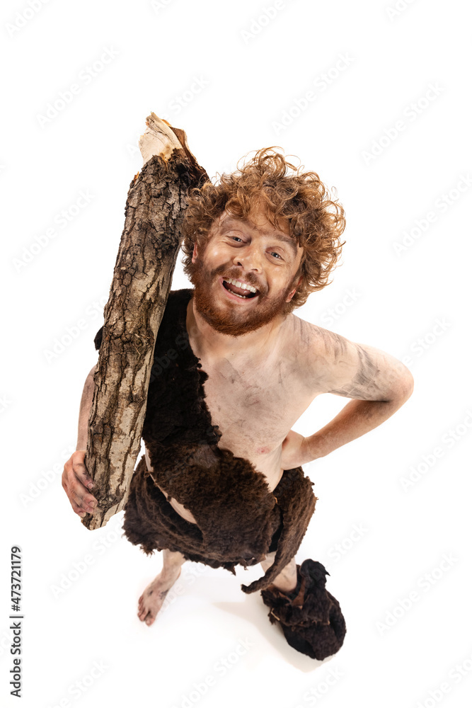 Full-length portrait of cute smiling man in character of neanderthal ...