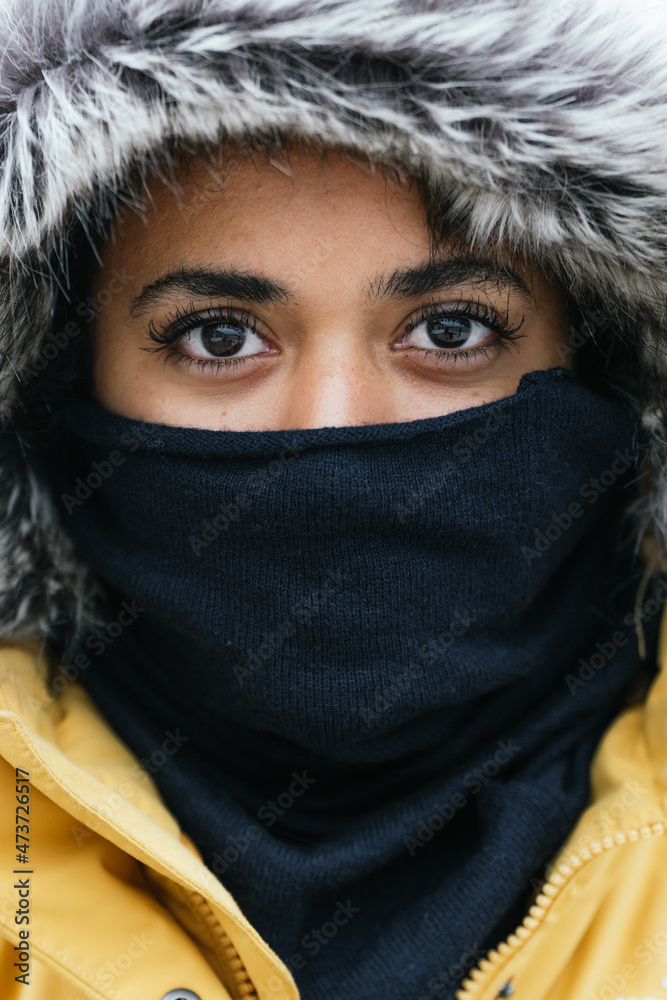 Arabic woman covering face with collar Stock Photo | Adobe Stock