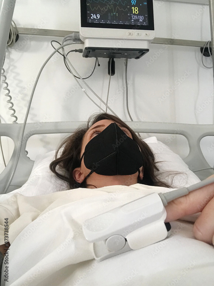 Woman Patient n Hospital bed on ICU Stock Photo | Adobe Stock