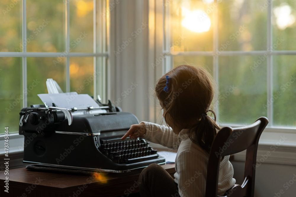 Typing on typewriter Stock Photo | Adobe Stock