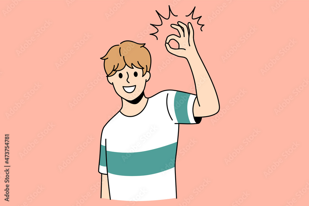 Ok and good luck sign concept. Smiling positive boy wearing t-shirt ...
